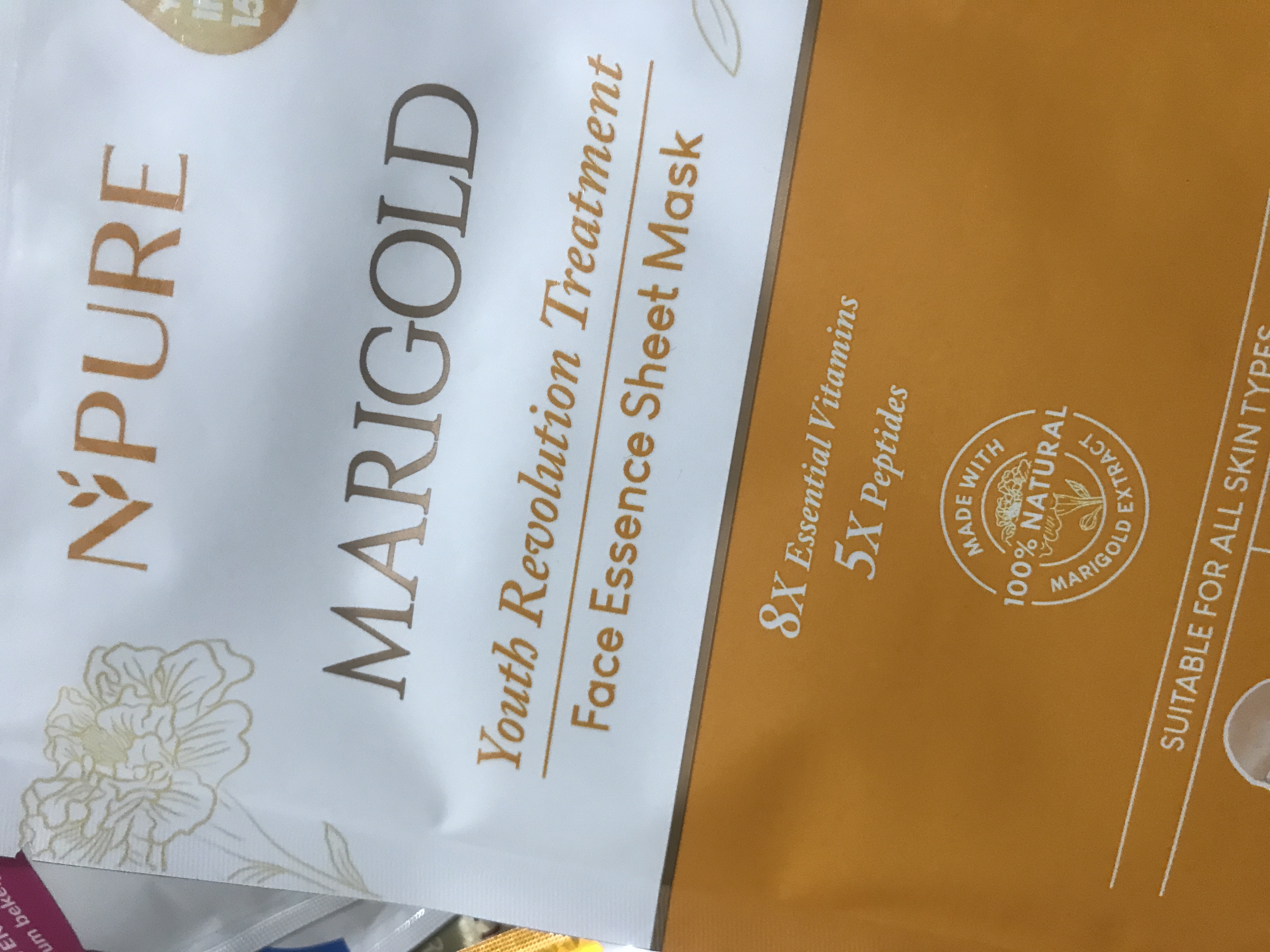 NPure Marigold Face Essence Sheet Mask - Review SOCO by Sociolla
